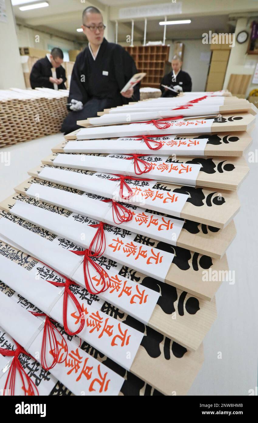 Talismans are laid out to be sold for the new year at Kawasaki Daishi ...