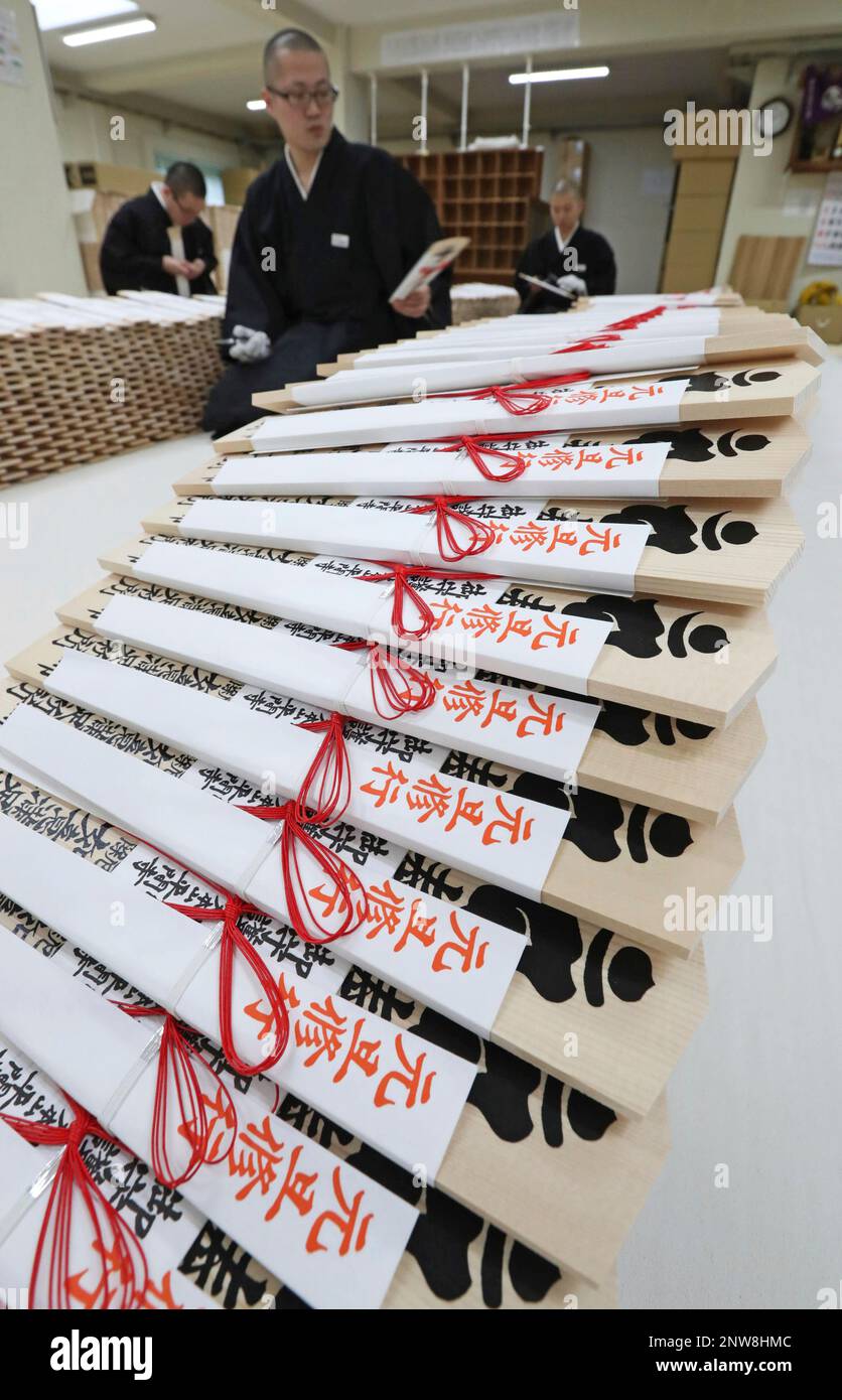 Talismans are laid out to be sold for the new year at Kawasaki Daishi ...