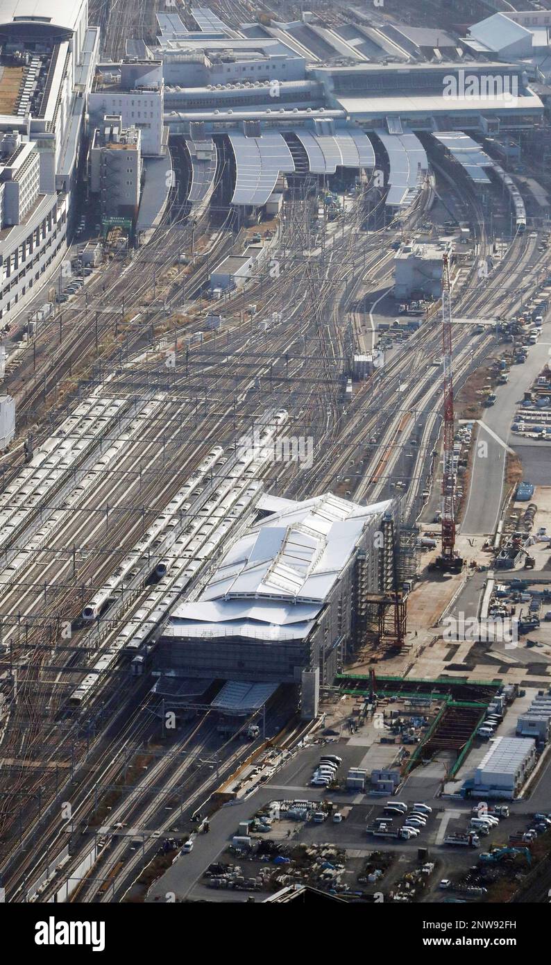An aerial photo shows new station of Yamanote Line under construction ...