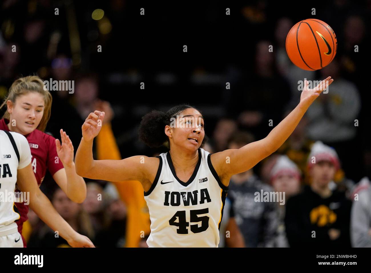 Iowa forward Hannah Stuelke grabs a rebound during the first half of an ...