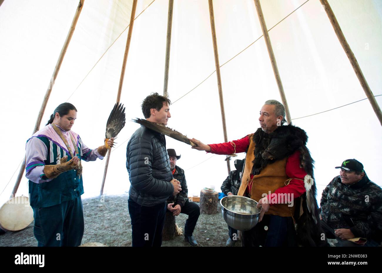 Canadian Prime Minister Justin Trudeau receives a water cleansing by ...