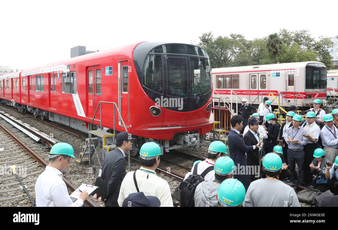 A photo shows Tokyo Metro's new vehicle(L) unveiled to media at the ...