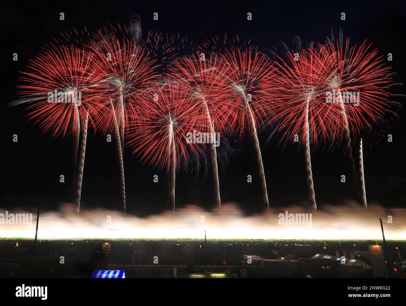 A photo shows fireworks launching in the night sky during the Omagari ...