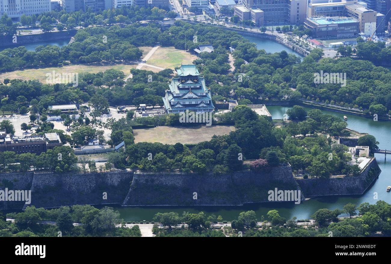 An aerial photo shows Osaka castle Tower in Osaka on July 27, 2018 ...
