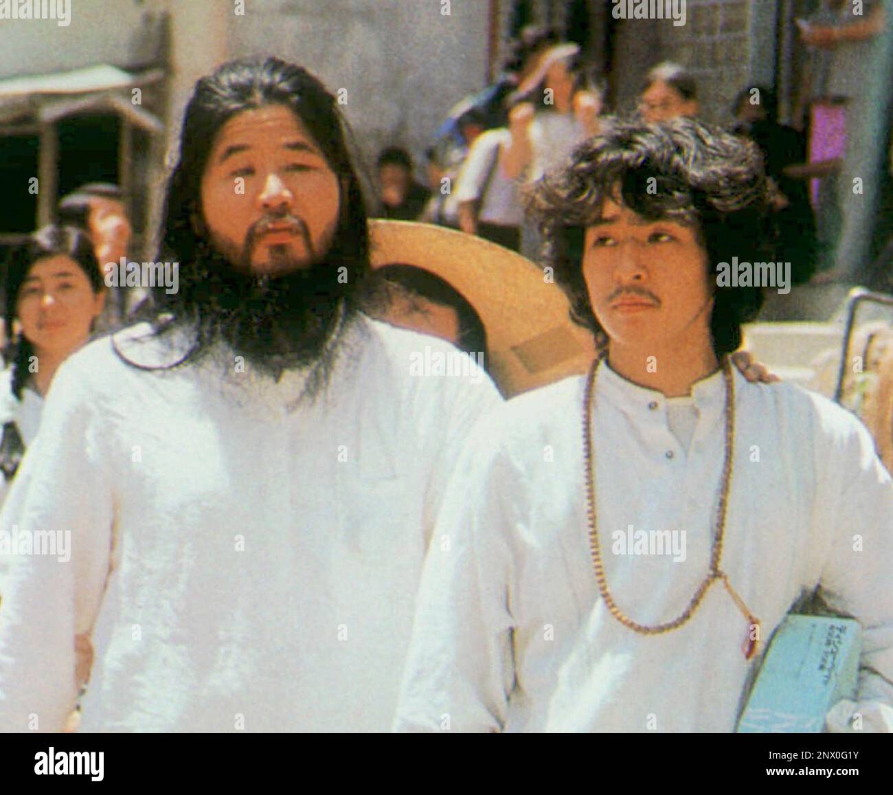 FILE - In this undated file photo, cult guru Shoko Asahara, left, of ...