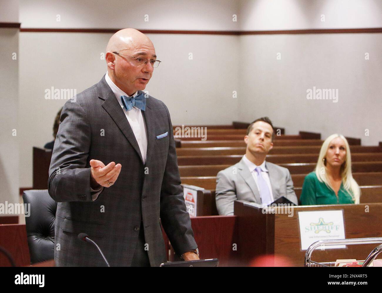 Nicole Oulson, wife of Chad Oulson, right, sits with her attorney TJ ...