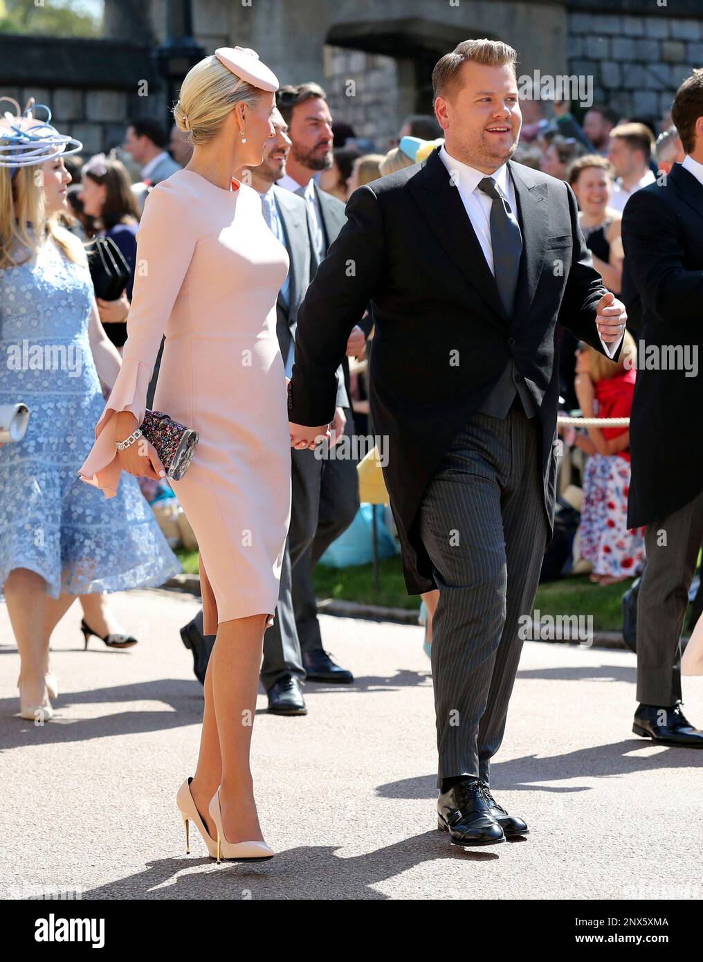 James Cordon and his wife Julia Carey arrive for the wedding ceremony ...