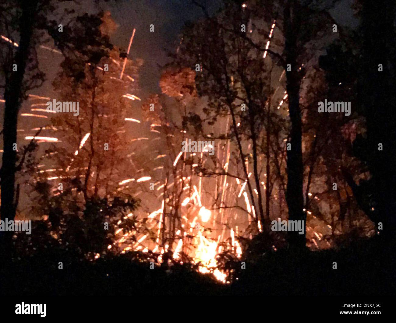 This photo provided by Shane Turpin shows results of the eruption from ...