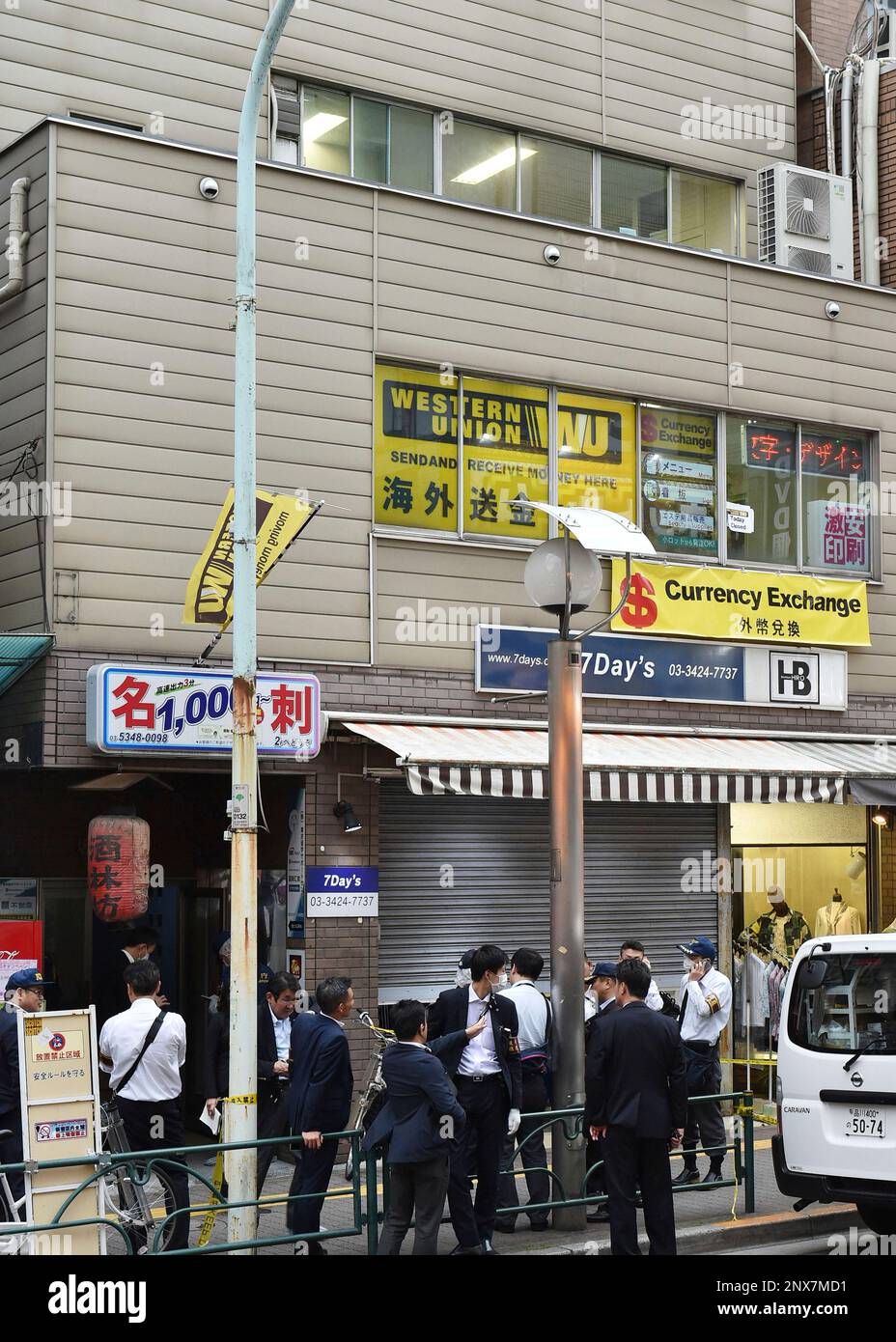 The Metropolitan Police Department officers conduct an investigation a ...