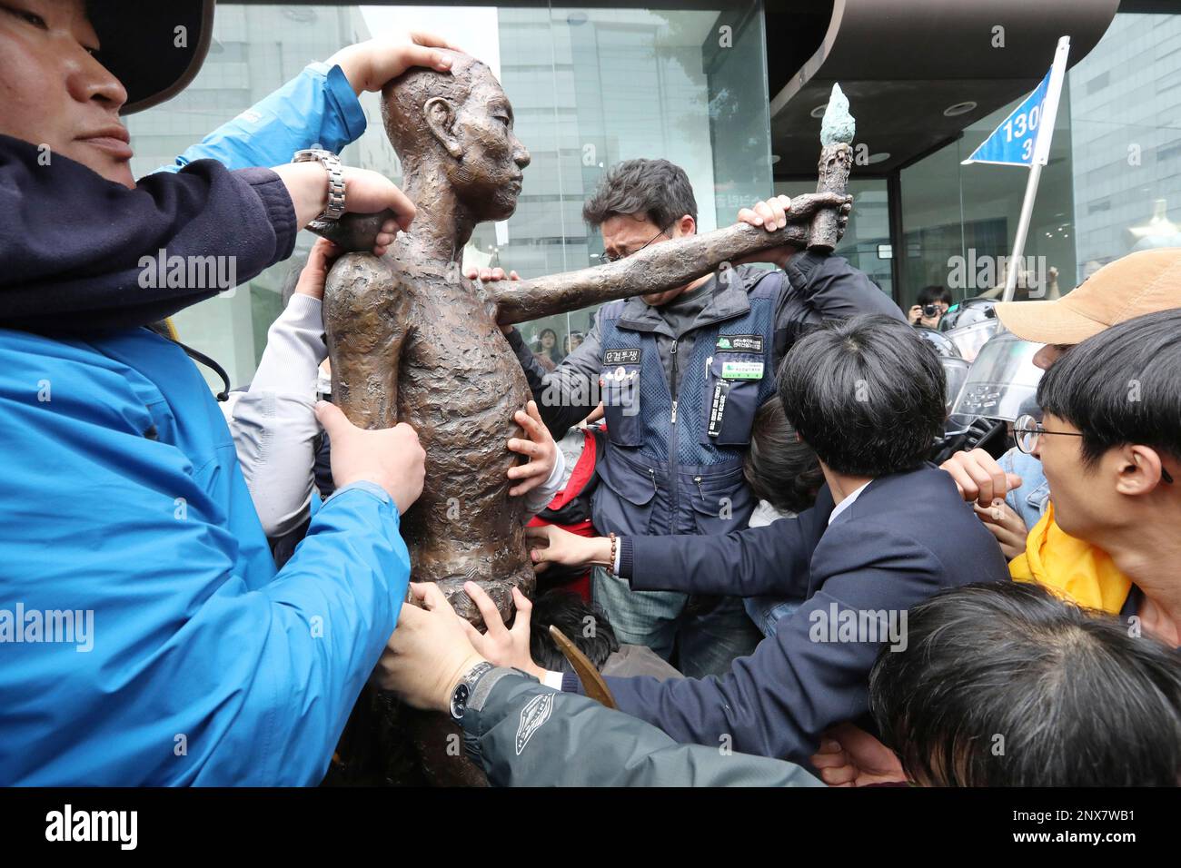 A clash takes place between the riot police official and members of ...