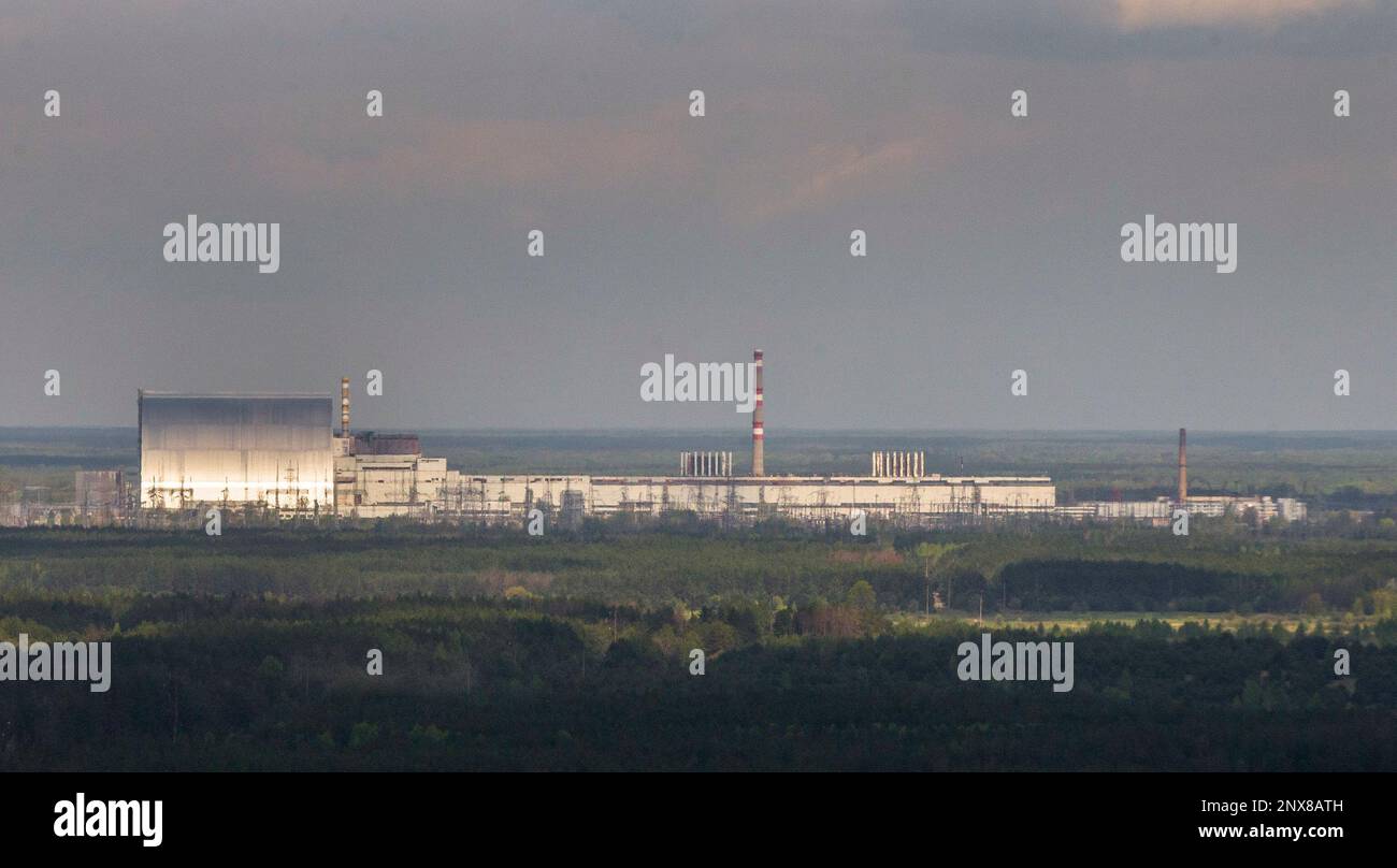 An aerial view of the Chernobyl nuclear power plant and a new shelter ...