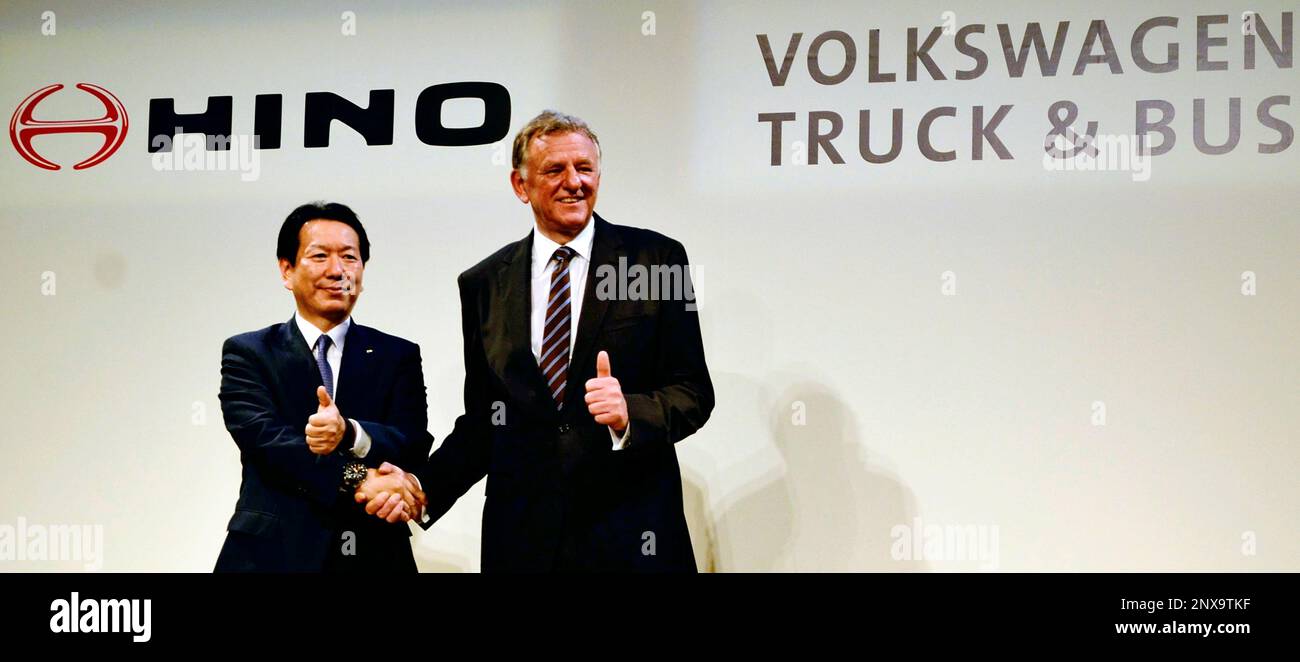 Germany's Volkswagen Truck & Bus GmbH CEO Andreas Renschler (R) and ...