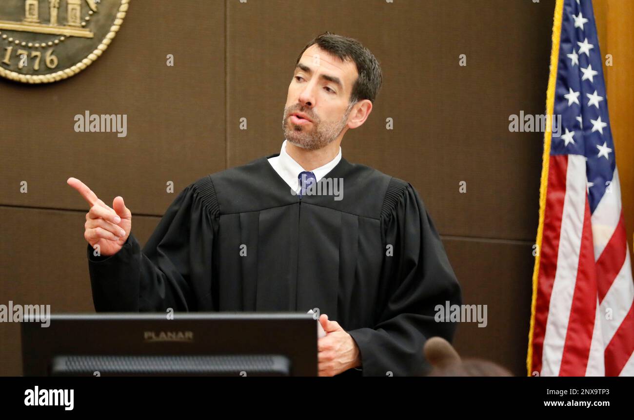 Fulton County Chief Judge Robert McBurney addresses the jury during the ...
