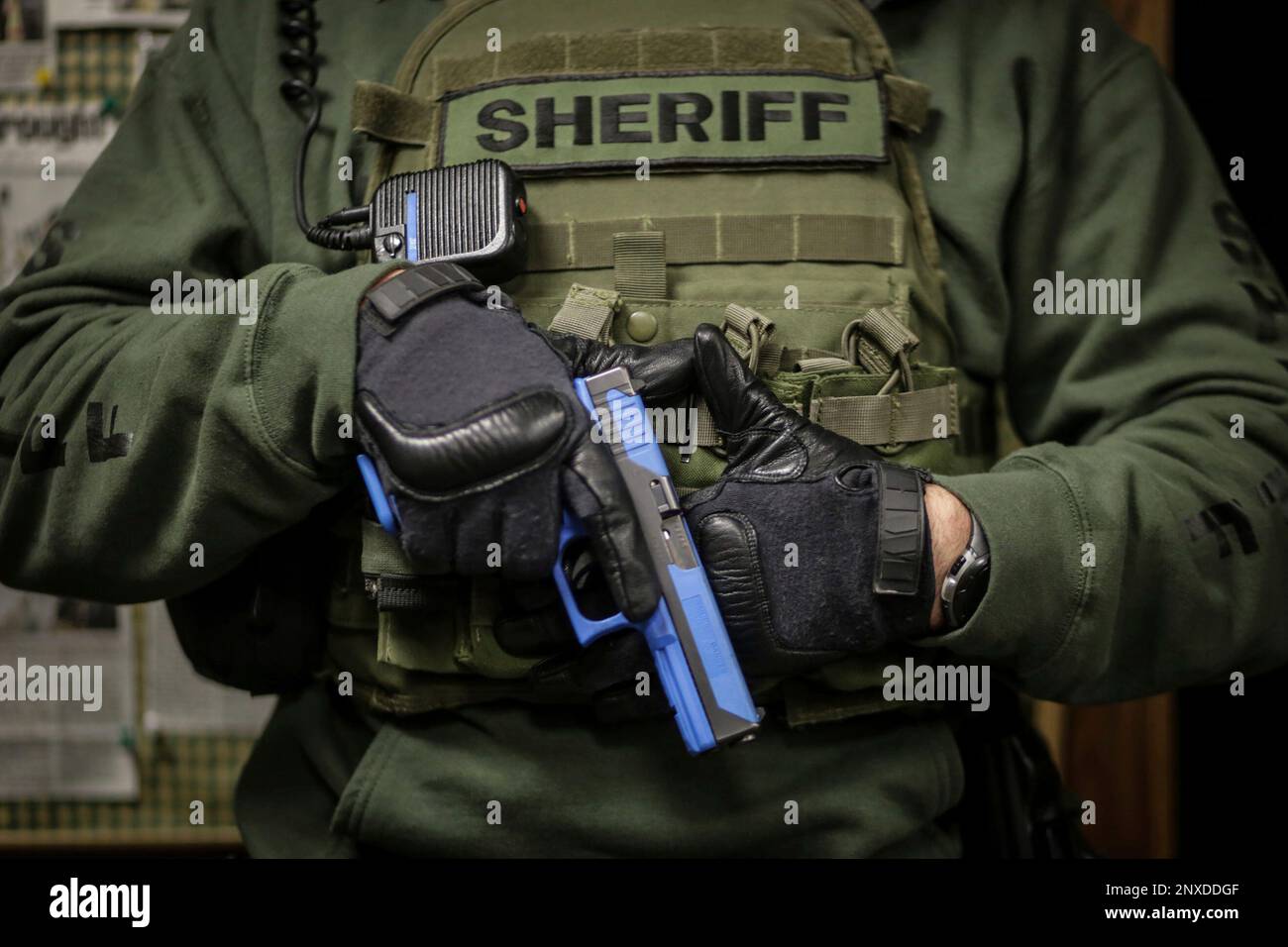 A member of the Bonneville County Sheriff's Office SWAT team stands ...