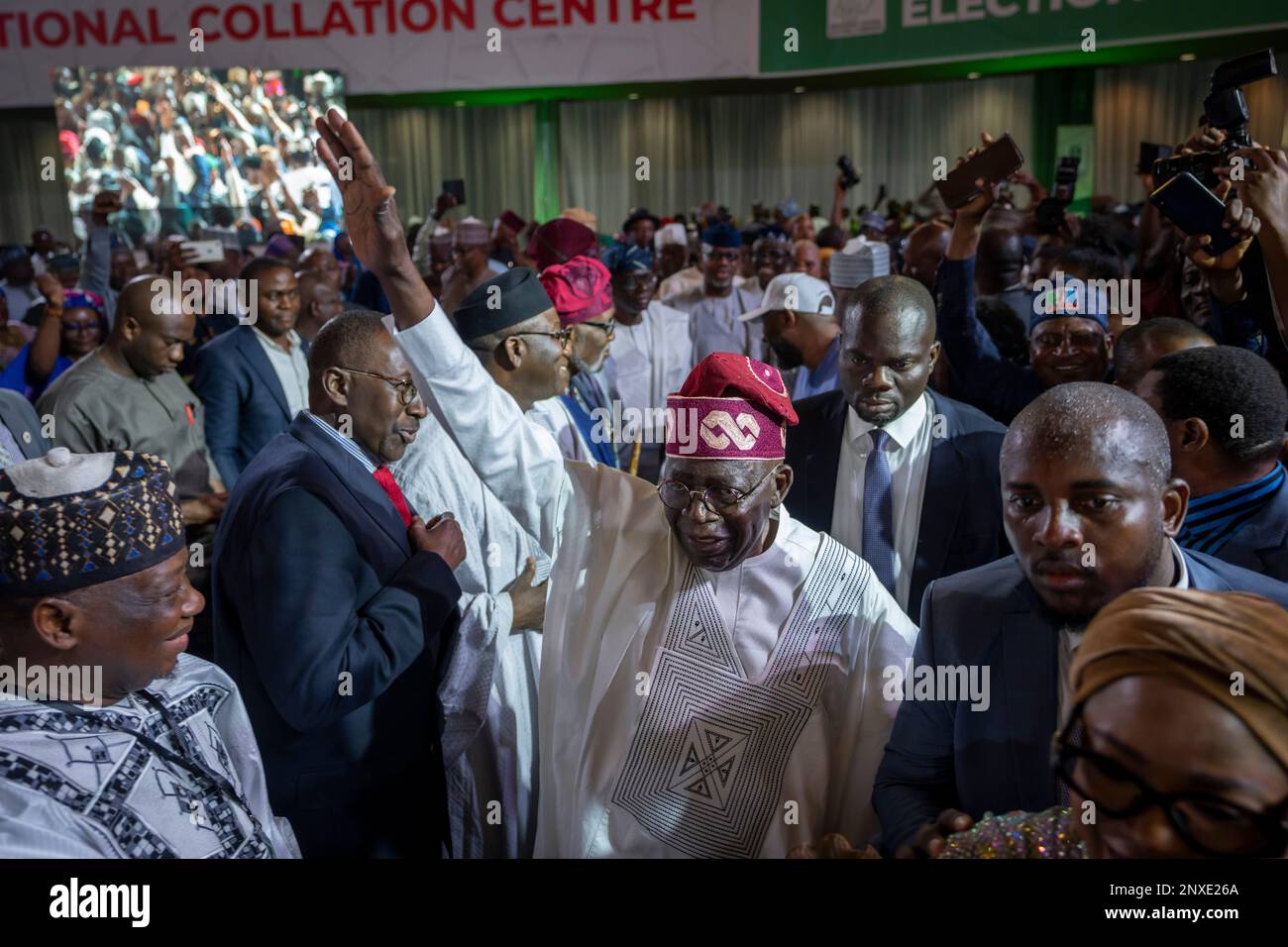 President-Elect Bola Tinubu, center, gestures to supporters after receiving his certificate at a ...