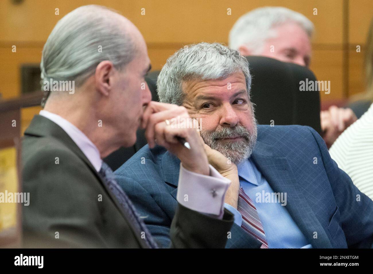 Defense attorney Bruce Harvey, left, speaks with defense attorney Don ...