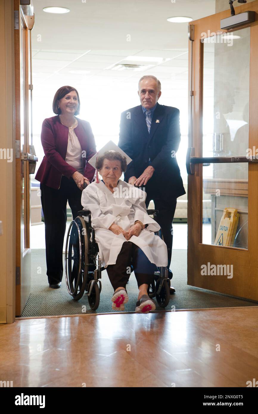 Ruth Osterman Frezza, 98, is wheeled into her graduation ceremony by ...