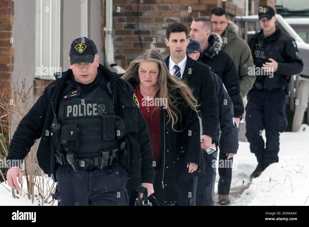 Forensic anthropologist professor Kathy Gruspier, second from left ...