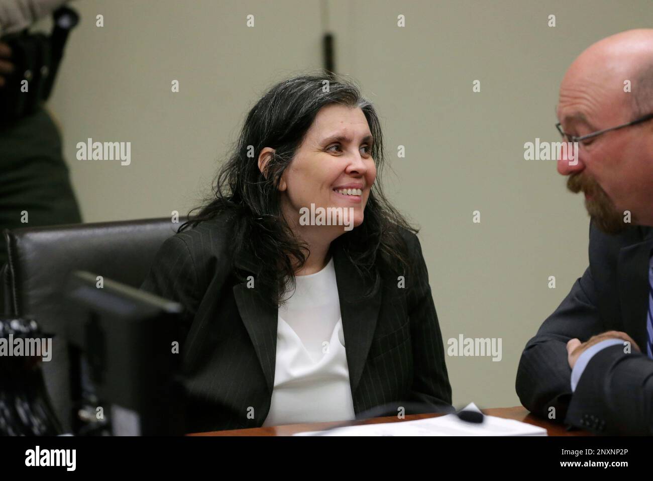 Louise Anna Turpin smiles as she appears in court with her attorney ...
