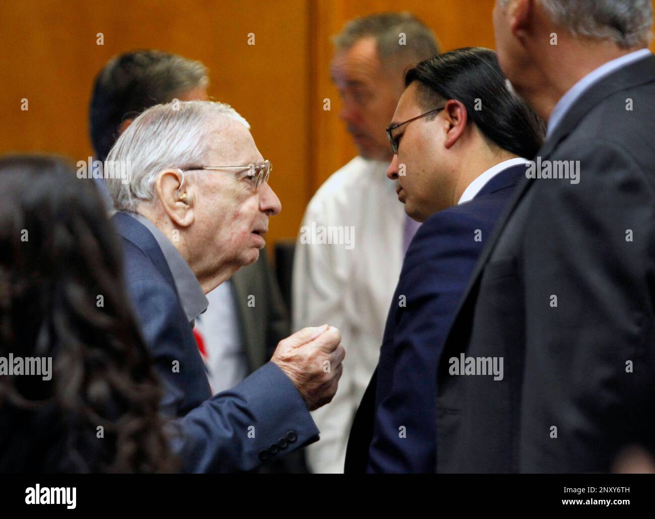John Feit talks with defense attorney O. Rene Flores after court ...