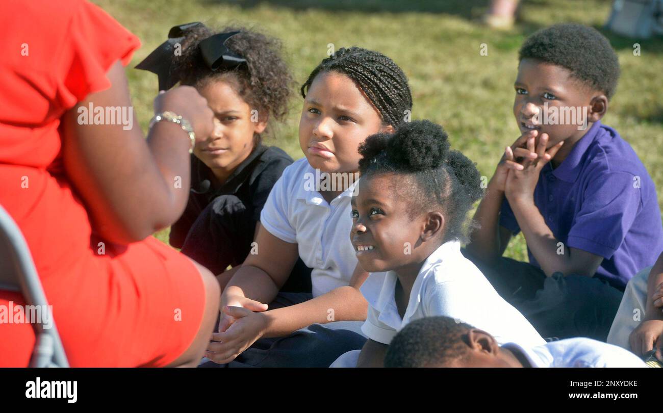 Kindergarten students from East Broad Elementary School listen as ...