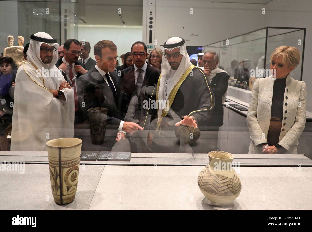 Chairman of Abu Dhabi's Tourism and Culture Authority, Mohammed Khalifa al-Mubarak, center right ...