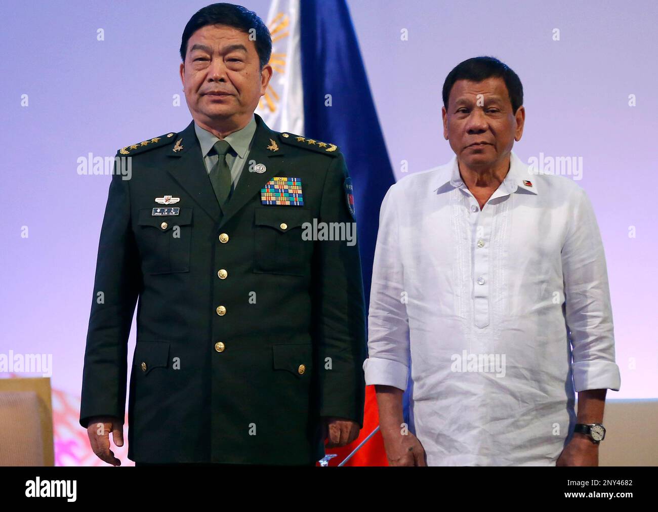 Chinese Defense Minister Gen. Chang Wanquan, left, poses with ...