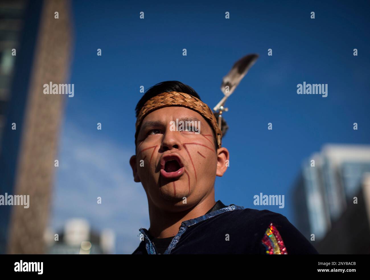 Ben Paul, of the Musqueam First Nation, sings and plays a drum during ...