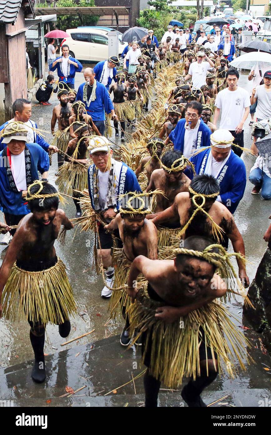Children, clad in head-to-toe in soot parade the streets drawing a ...