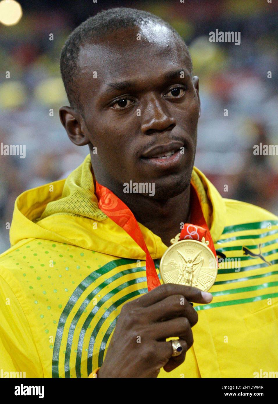 FILE - In this Aug. 17, 2008 file photo Jamaica's Usain Bolt shows his ...