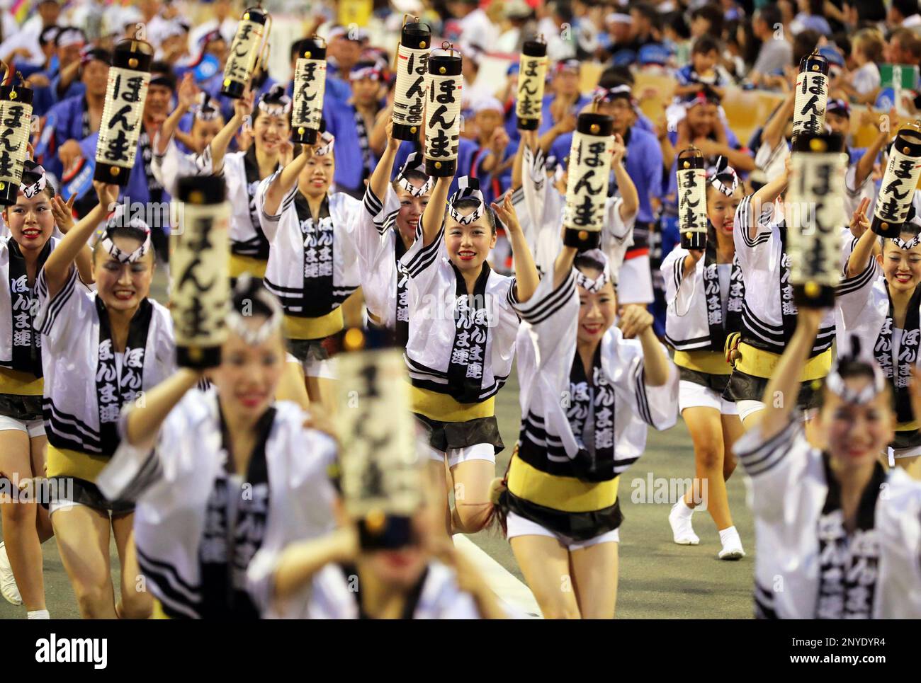 Dancers perform in tight formation during their Awa odori, the Awa Dance Festival in Tokushima ...
