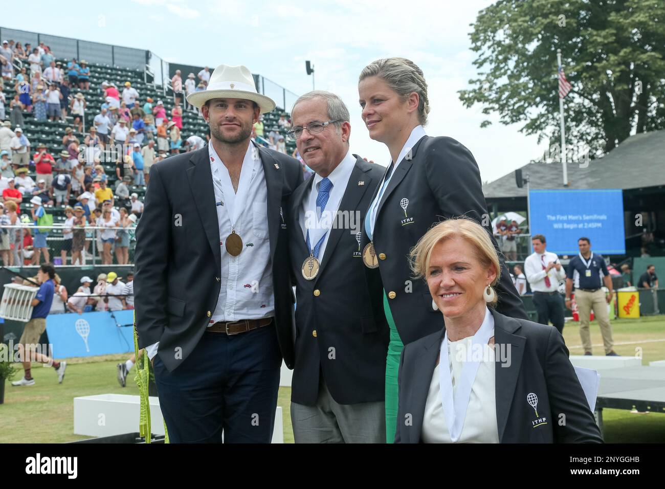 NEWPORT, RI - JULY 22: Monique Kalkman, Kim Clijsters, Steve Flink ...