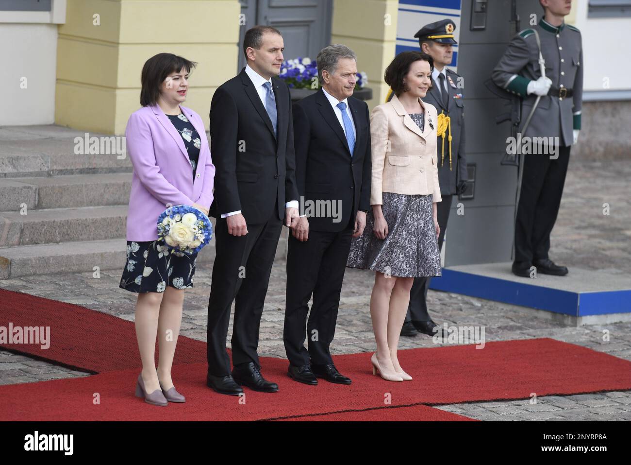 Finnish President Sauli Niinist, third from left, and wife Jenni Haukio, fourth from left ...