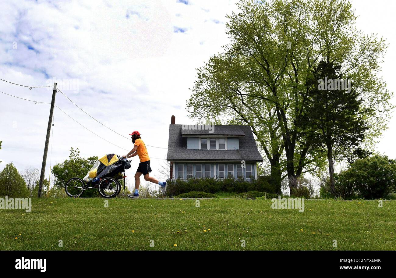 Rob Pope, of Liverpool, England, makes his way along Route 5 in Sennet ...