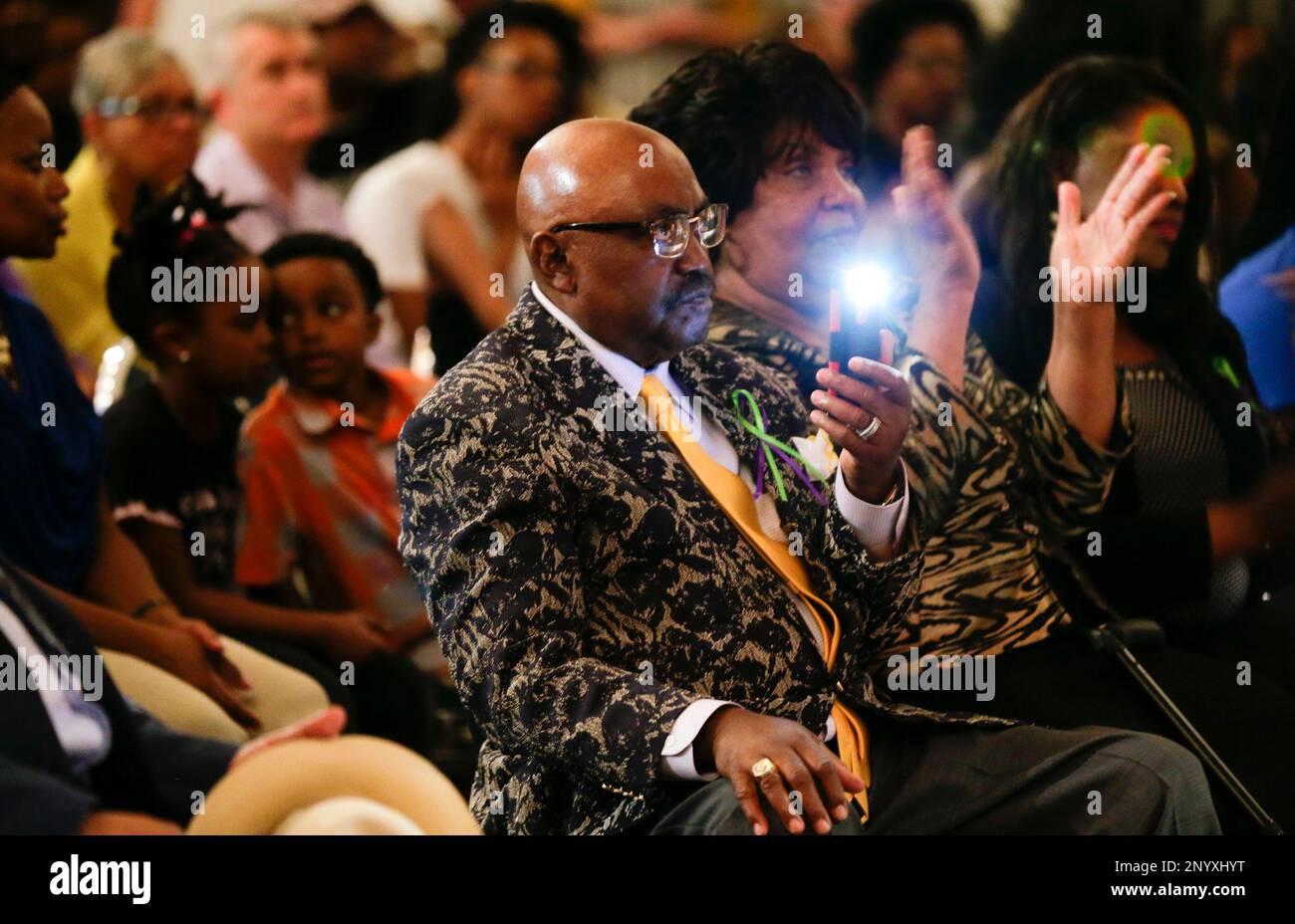 Rev. Joey Crutcher, father of Terence Crutcher, records video as Rev ...