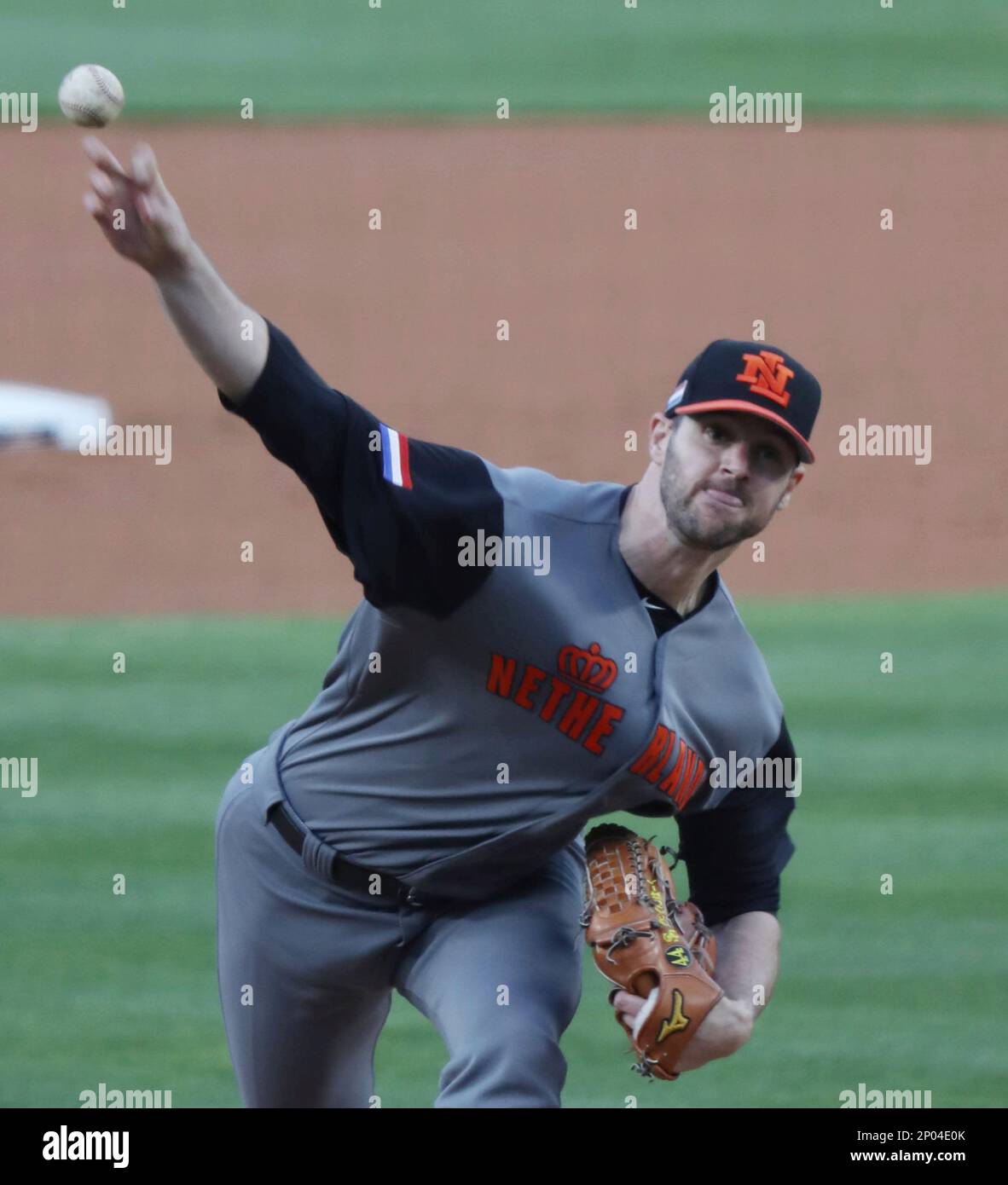 Netherlands' starter Rick van den Hurk hurls a ball against Puerto Rico ...