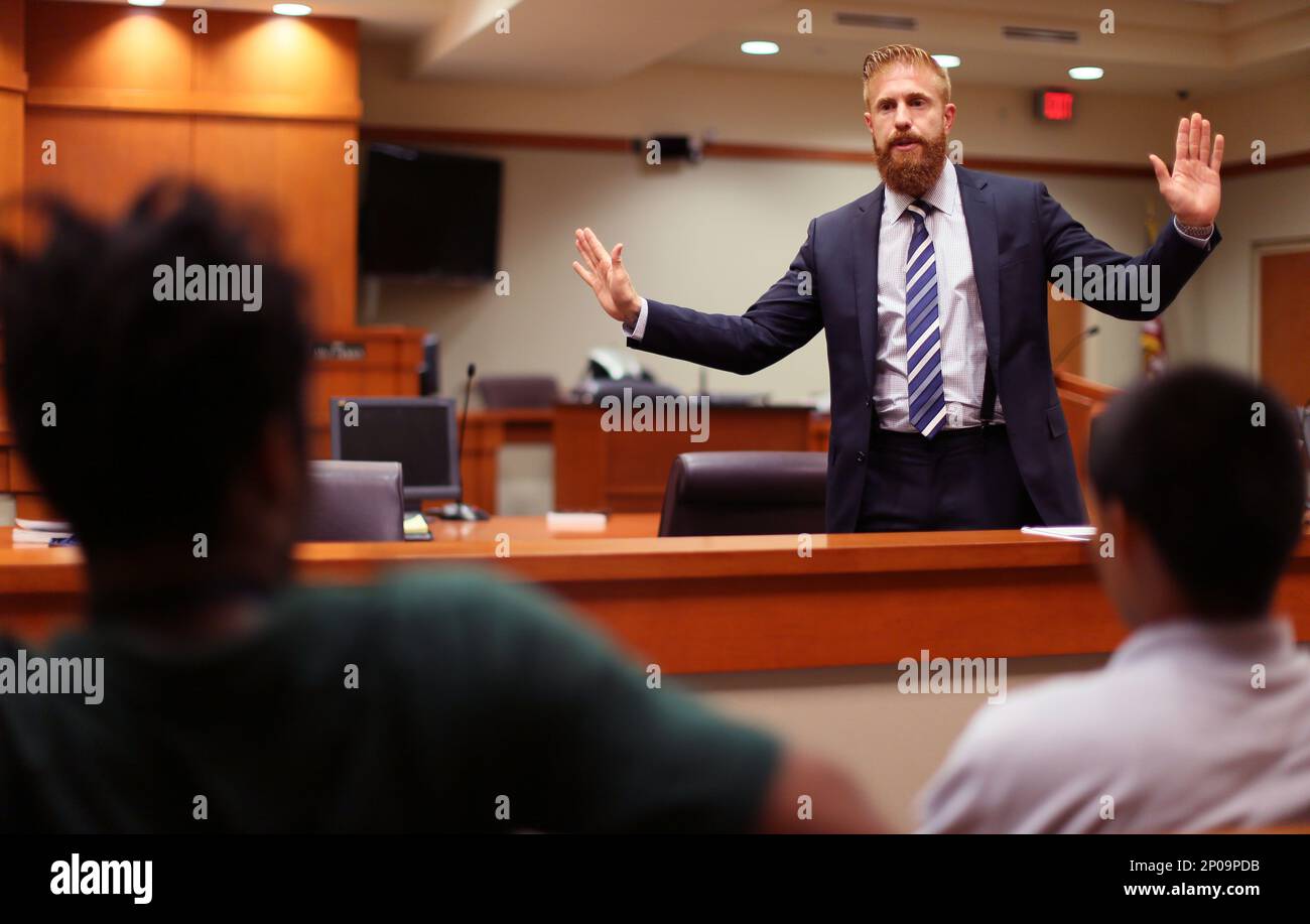 Lawyer David Lee Windecher speaks to a two young offenders, Luis Rangel ...