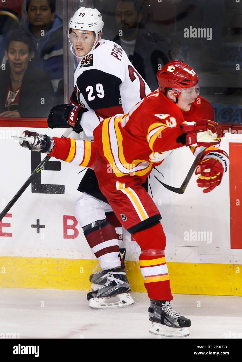 NHL profile photo on Calgary Flames' Sam Bennett, right, hitting ...