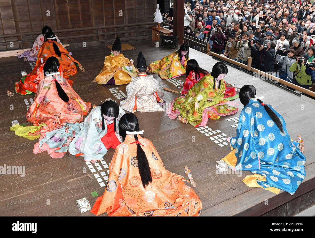 12 female and men wearing an ancient costume attend Karuta hajime ...