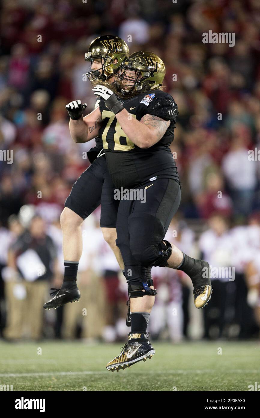 Tyler Hayworth (78) celebrates with Mike Weaver (7) after Weaver kicked ...