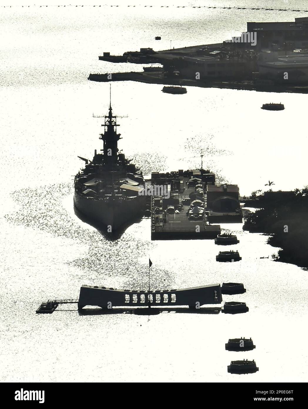 An aerial photo shows the silhouettes of USS Missouri(C) and USS ...