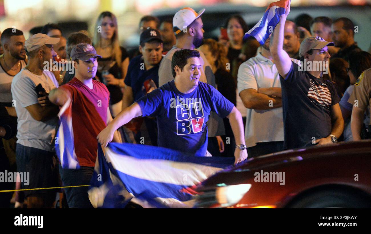 People react to the death of Cuban leader Fidel Castro in Miami ...