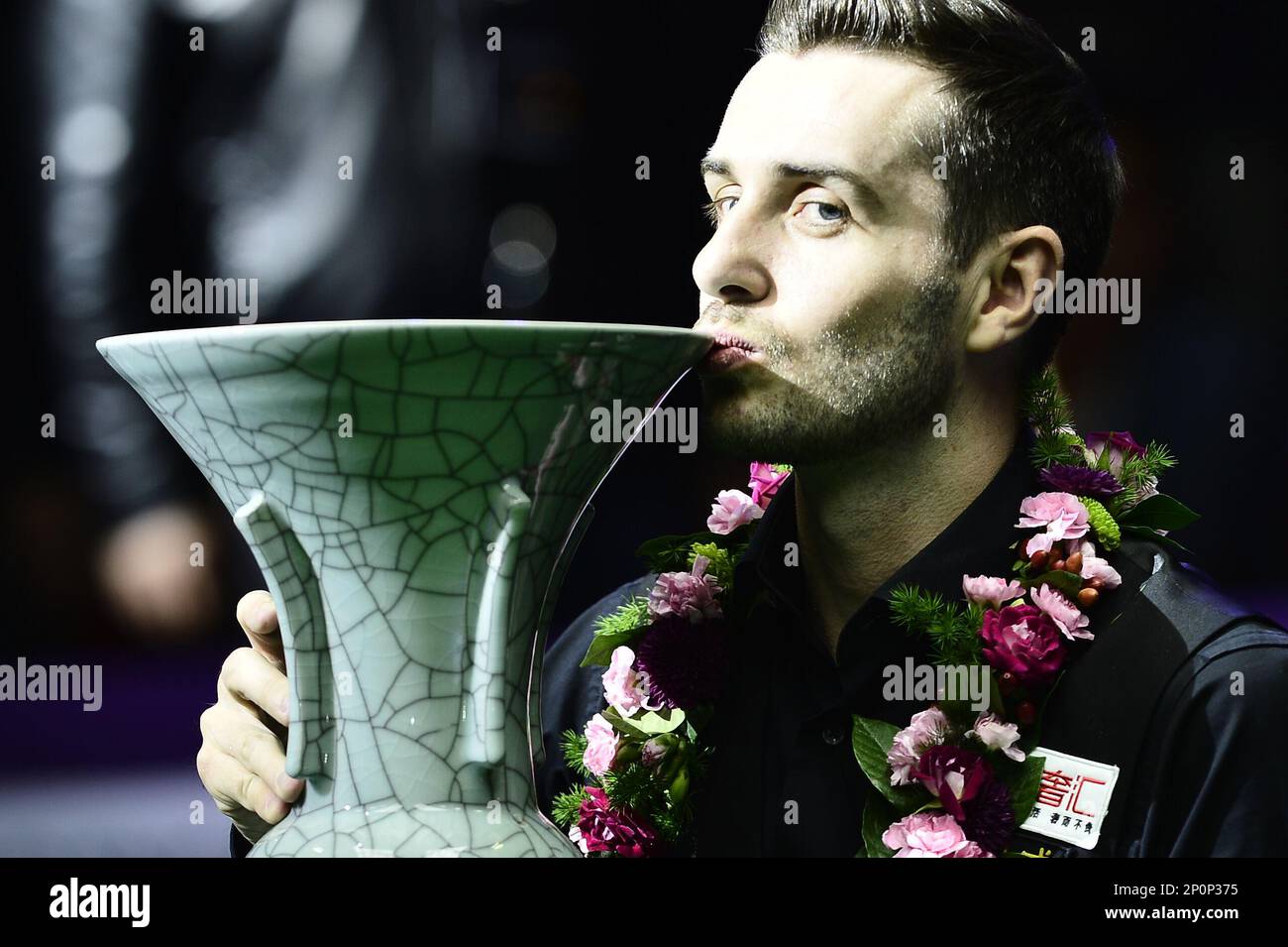 Mark Selby of England kisses his trophy after defeating Ding Junhui of ...