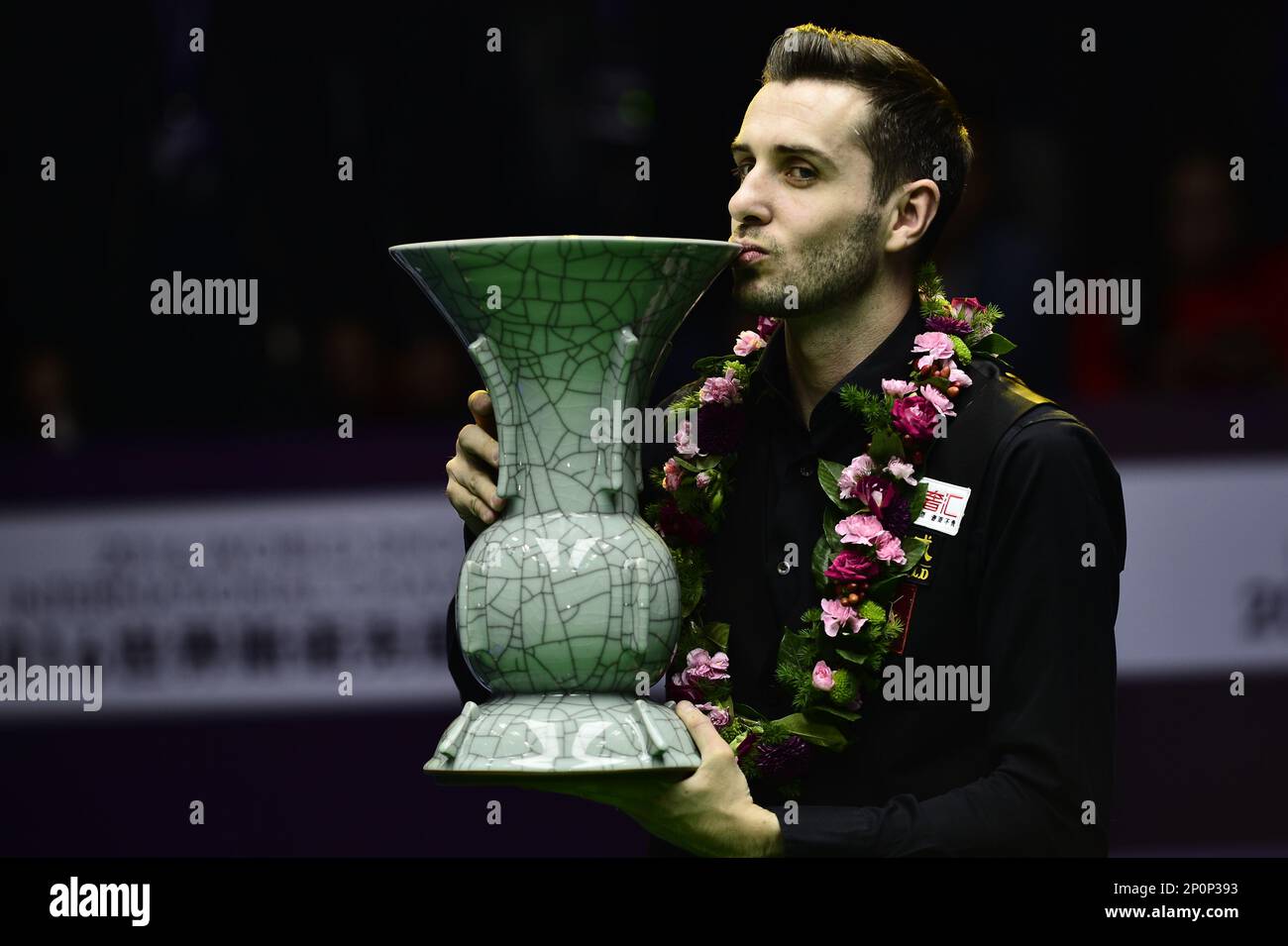 Mark Selby of England kisses his trophy after defeating Ding Junhui of ...
