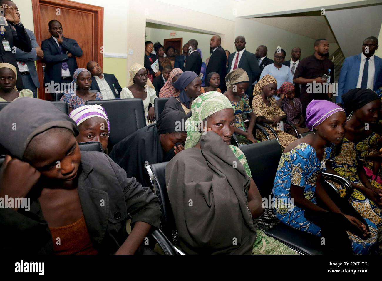 In this photo released by the Nigeria State House, freed Chibok school girls sit during a ...