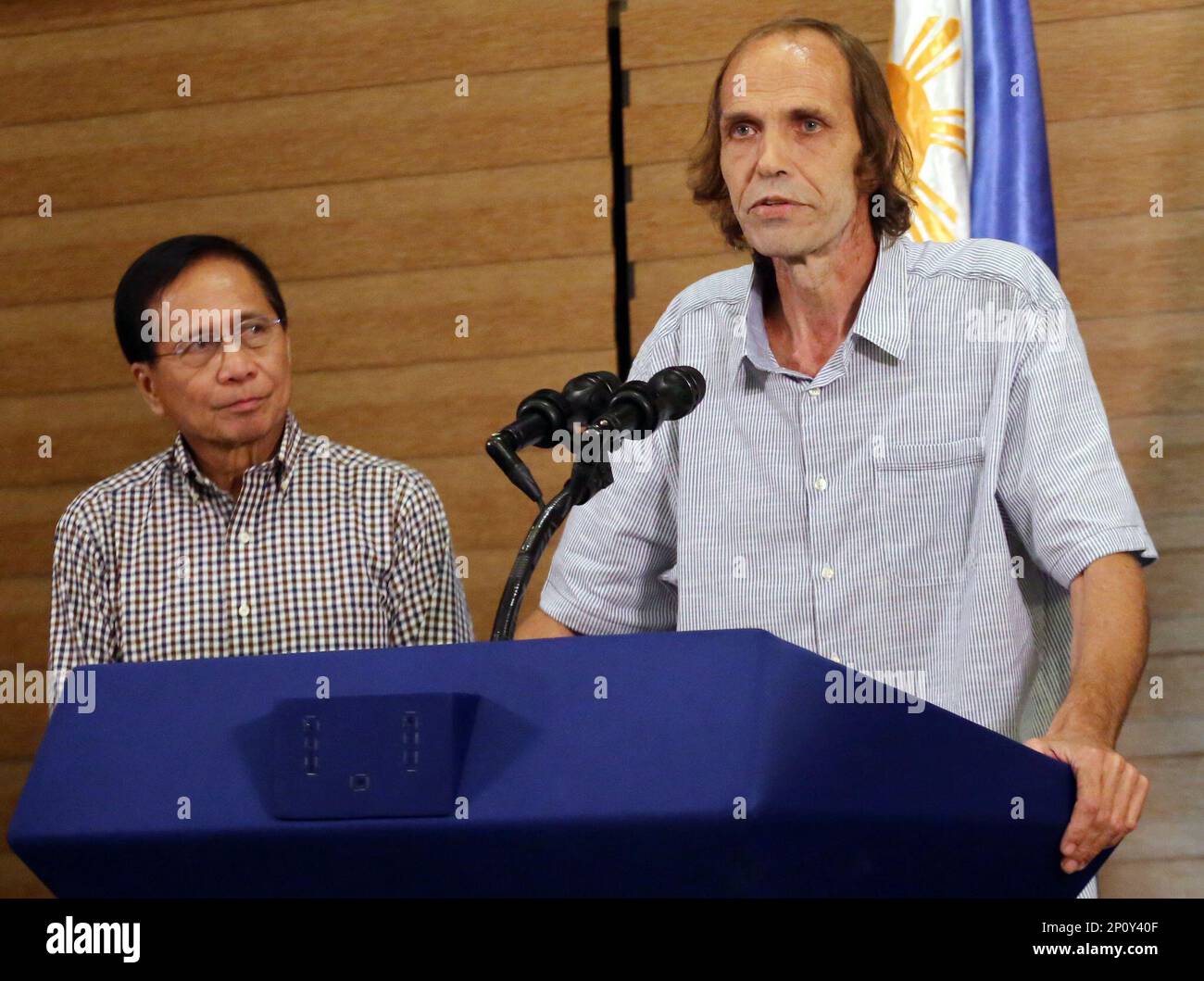 Released Norwegian hostage Kjartan Sekkingstad, right, briefly delivers ...