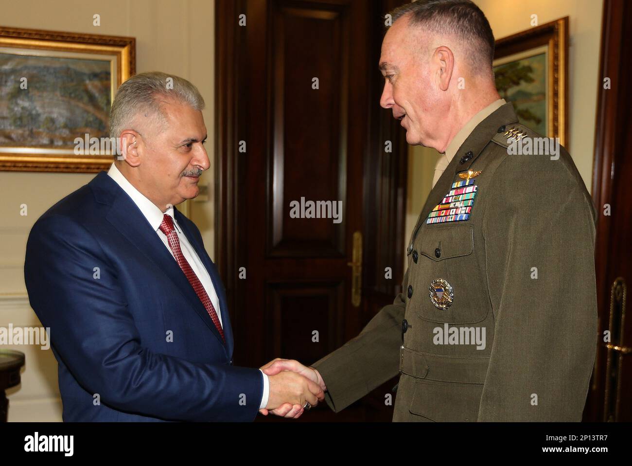Turkey's Prime Minister Binali Yildirim, left, and The U.S. chairman of the Joint Chiefs of ...
