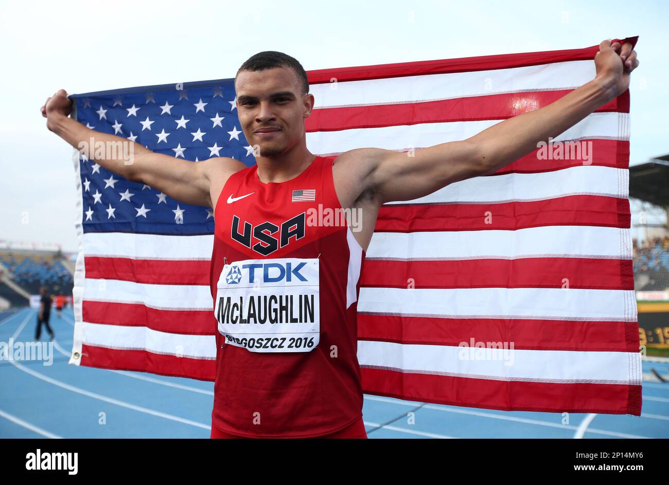 Taylor McLaughlin (USA) poses with United States flag after placing ...