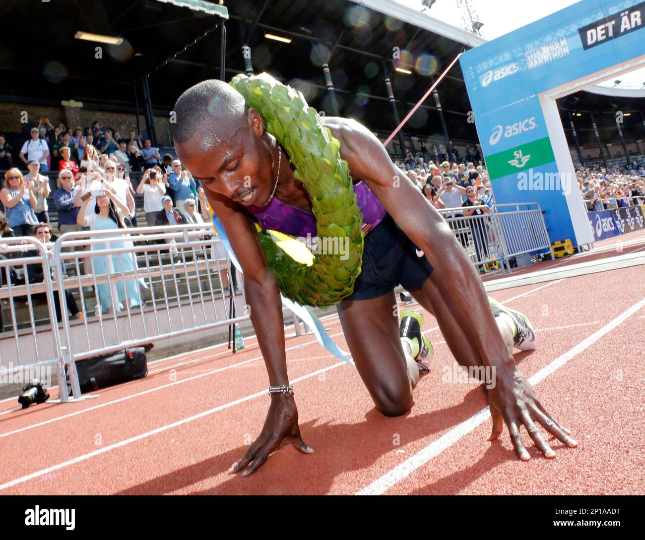 Kenya's Stanley Kipchirchir Koech after crossing the finish line to win ...