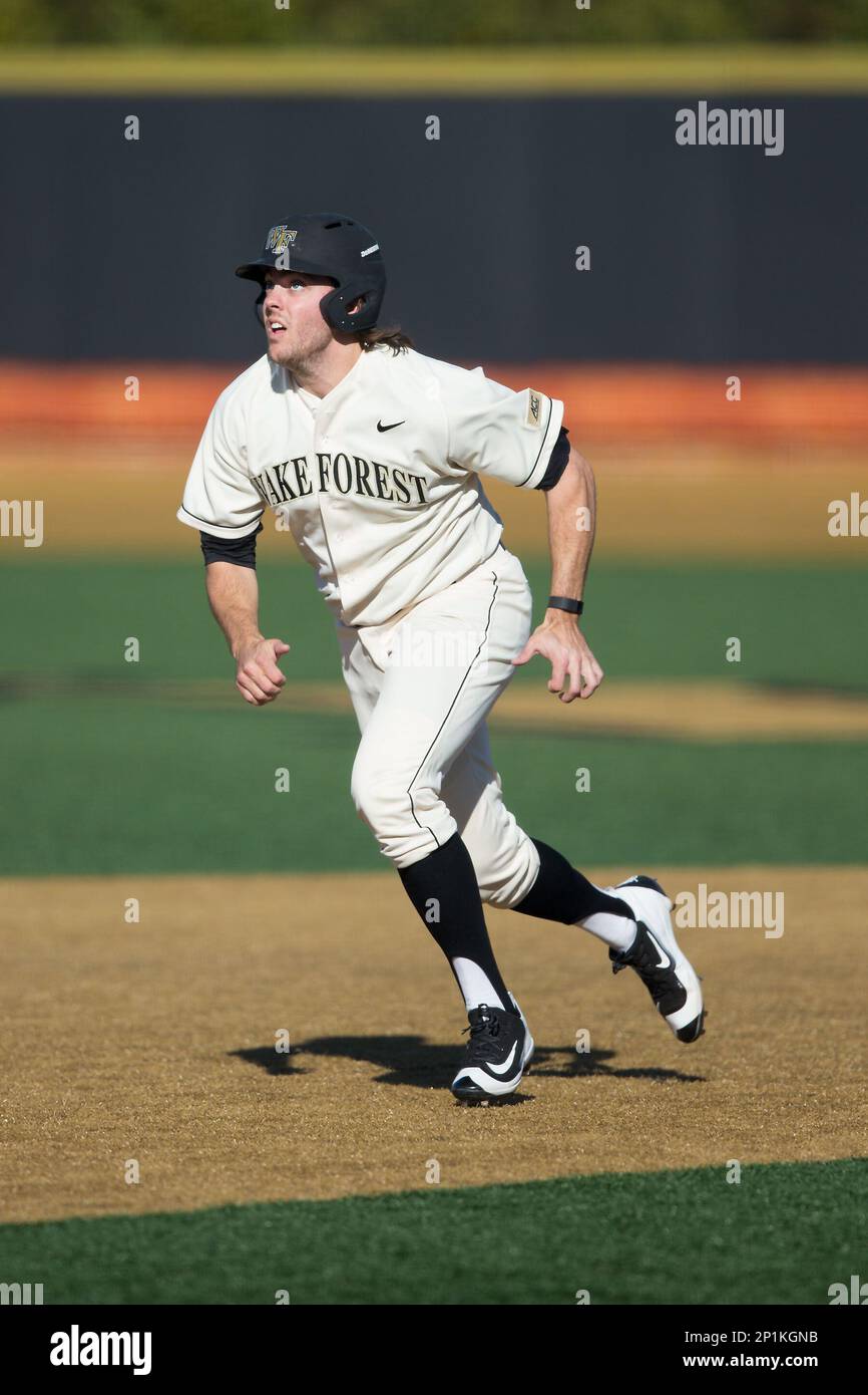 Will Craig (22) of the Wake Forest Demon Deacons takes off for third ...